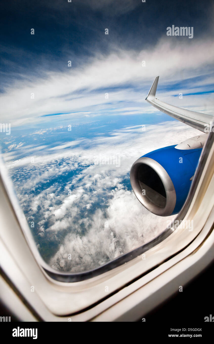 Classic image through aircraft window onto jet engine Stock Photo - Alamy