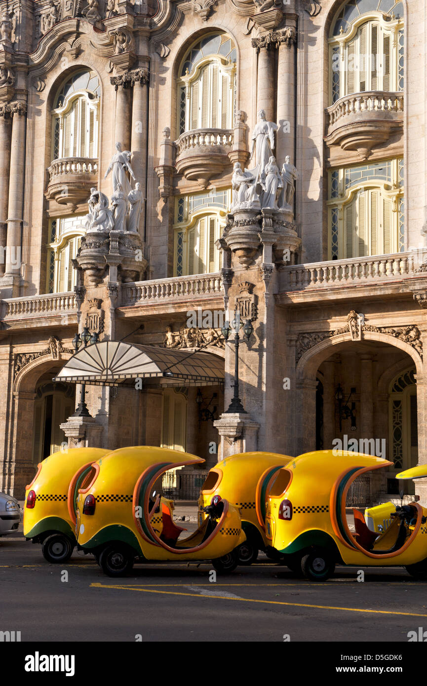 A line of coco cabs in front of the Grand Theatre in Havana, Cuba Stock ...