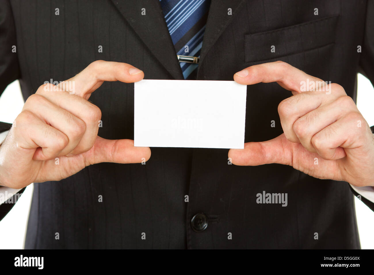 Image of a businessman holding a blank in the hand. Isolated on white ...