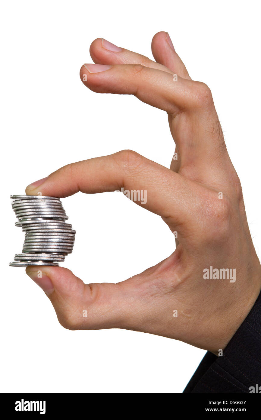 man's hand holding a stack of silver coins on white background Stock ...