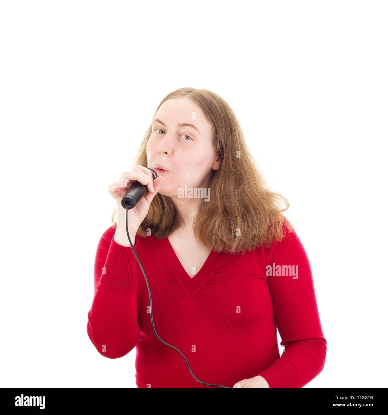 Beautiful woman singing and dancing Stock Photo - Alamy