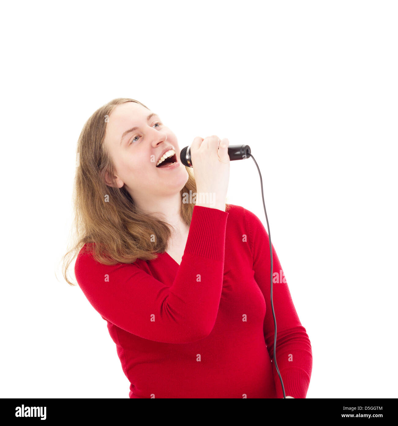 Beautiful woman singing and dancing Stock Photo - Alamy