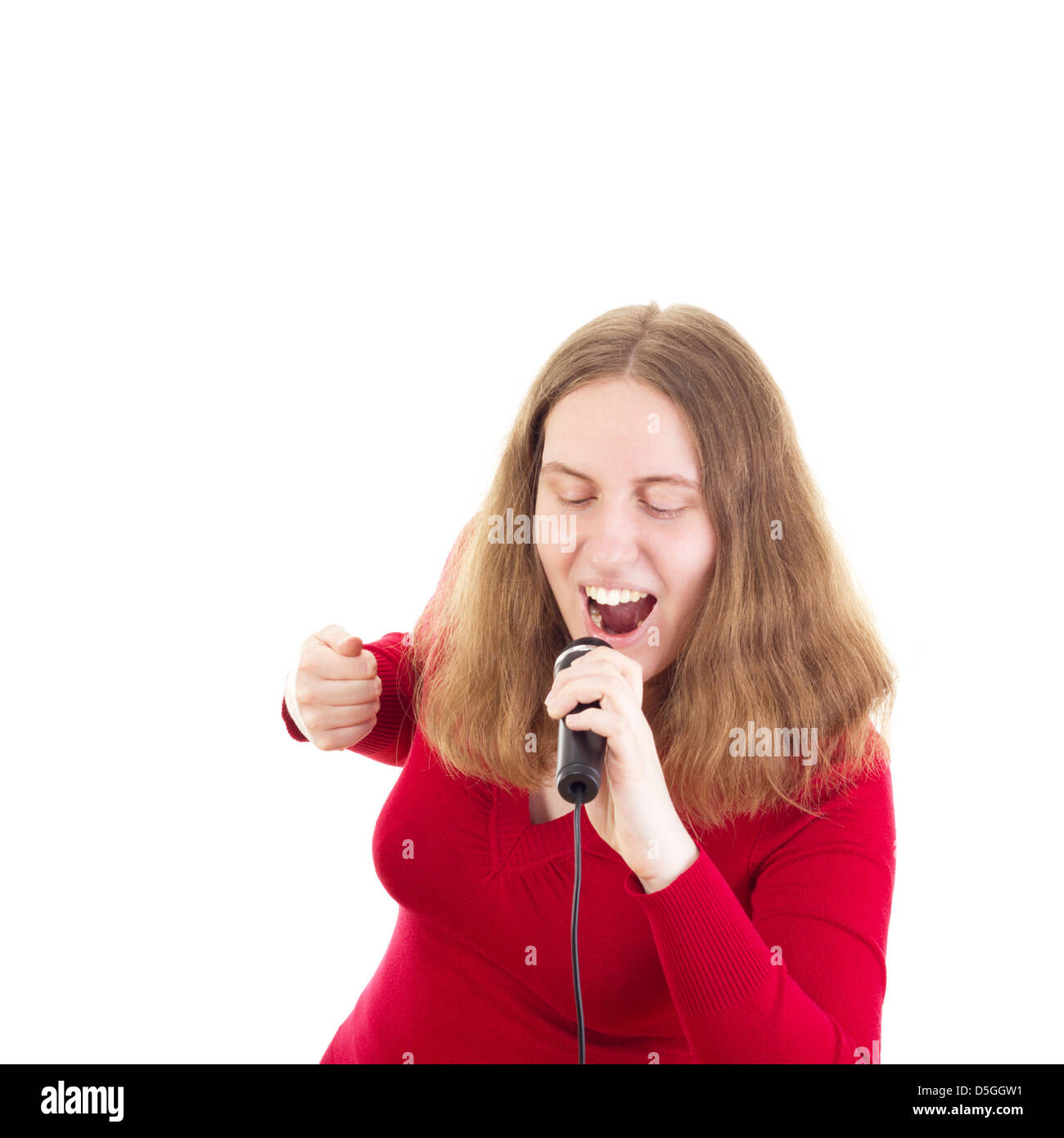 Beautiful woman singing and dancing Stock Photo - Alamy