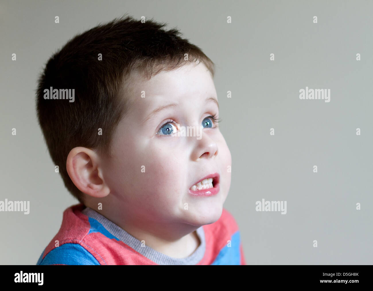 Happy little boy reaction face hi-res stock photography and images - Alamy