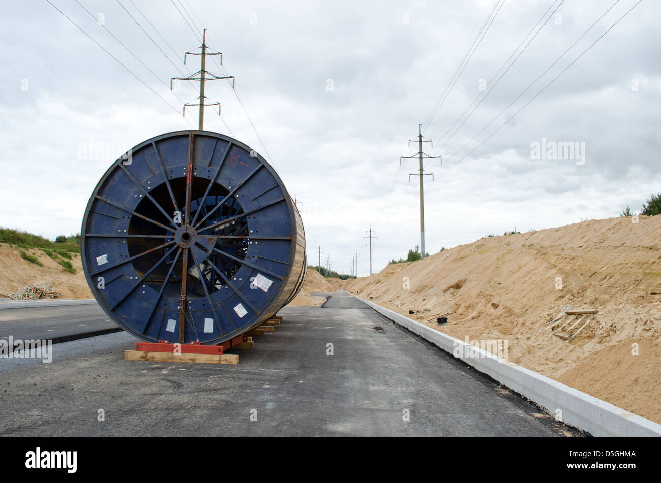road building work and electricity line laying underground. huge high ...
