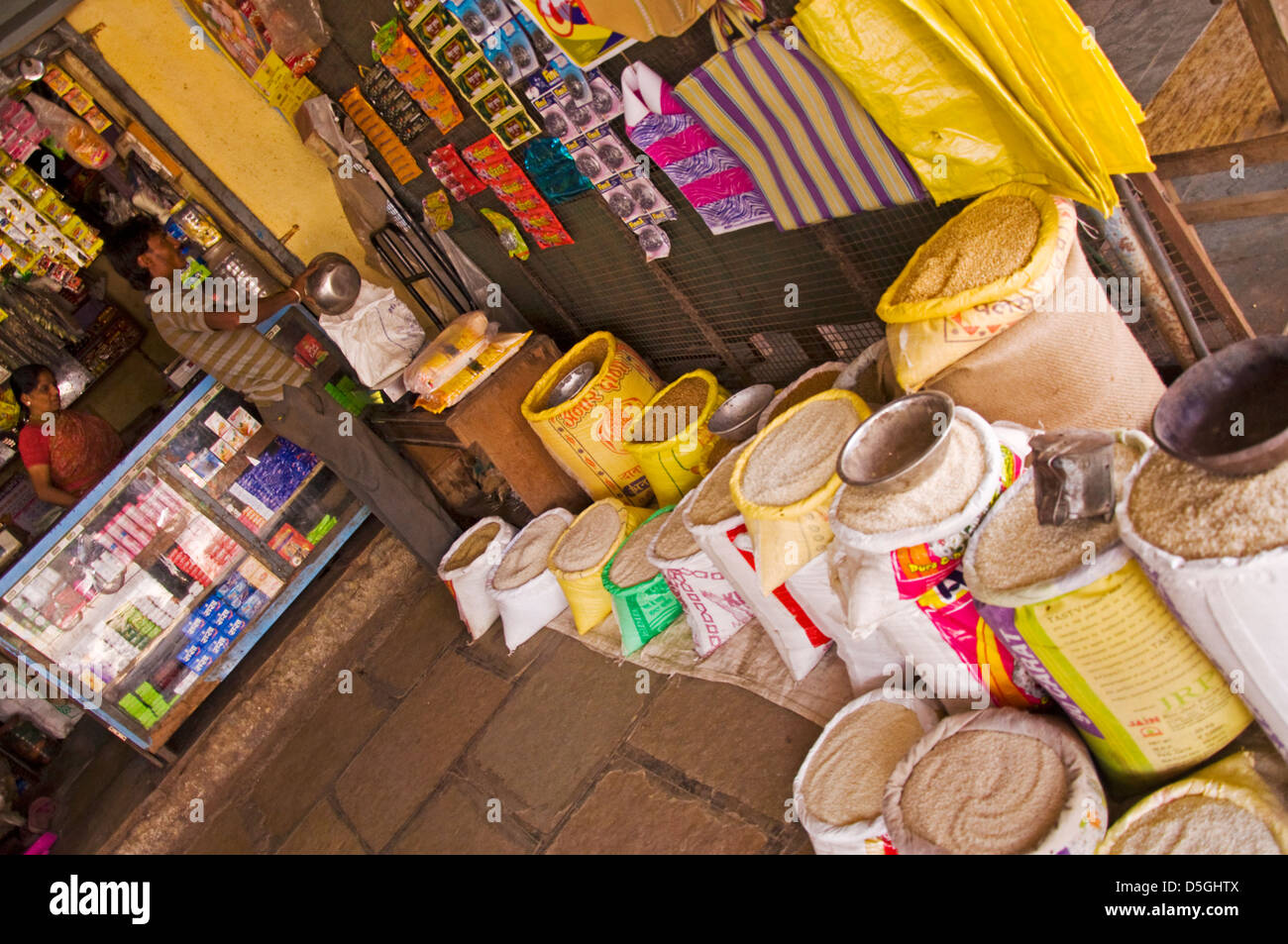 Different types of rice in sacks at a shop in Paud Stock Photo - Alamy