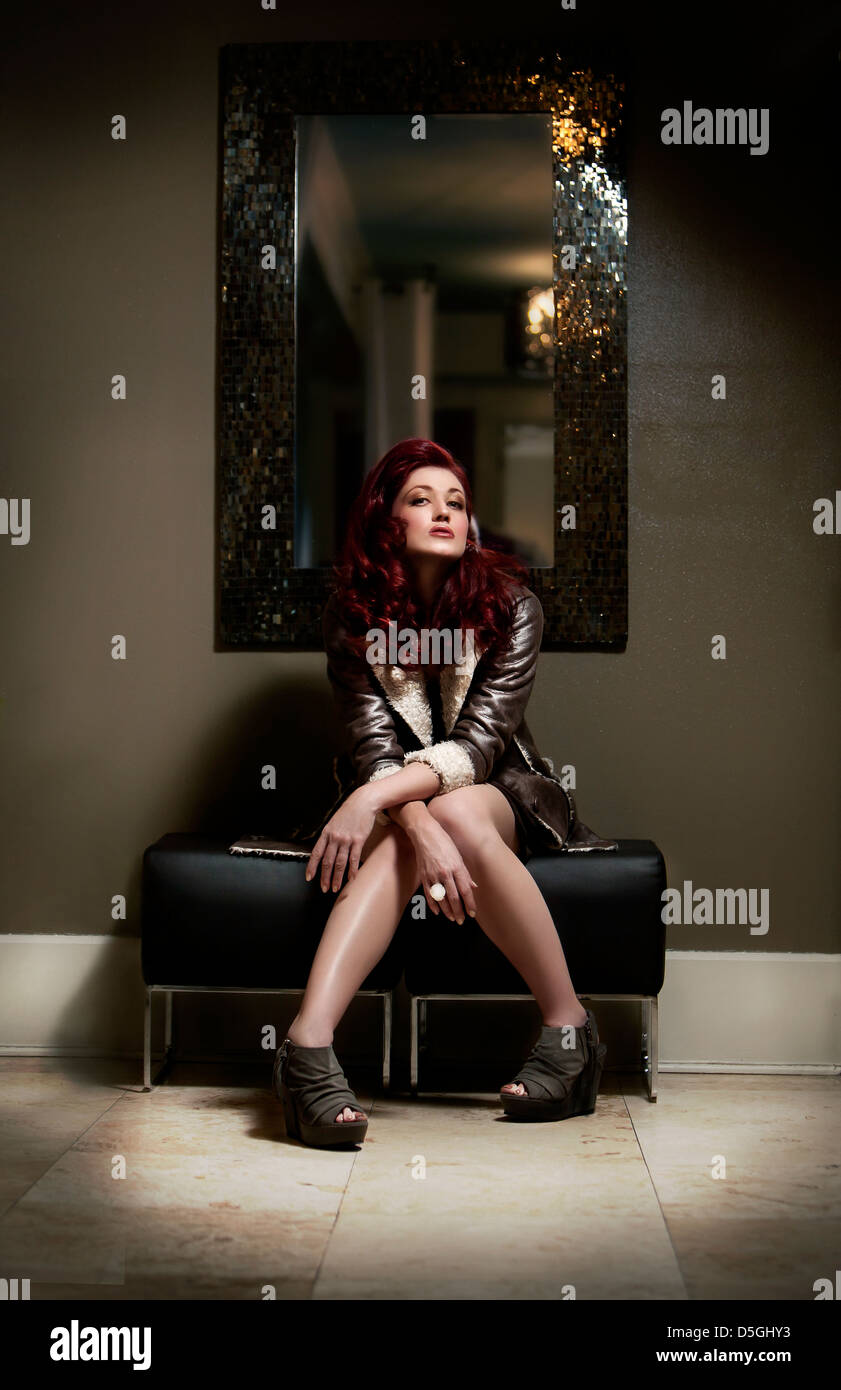 woman sitting on bench with mirror Stock Photo - Alamy