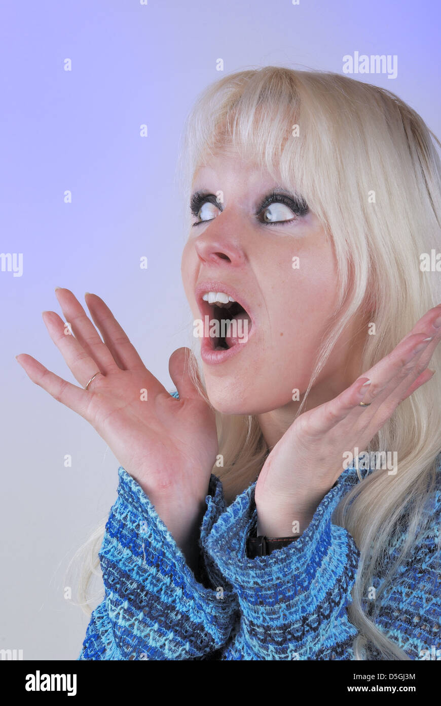 Beautiful surprised woman Stock Photo - Alamy