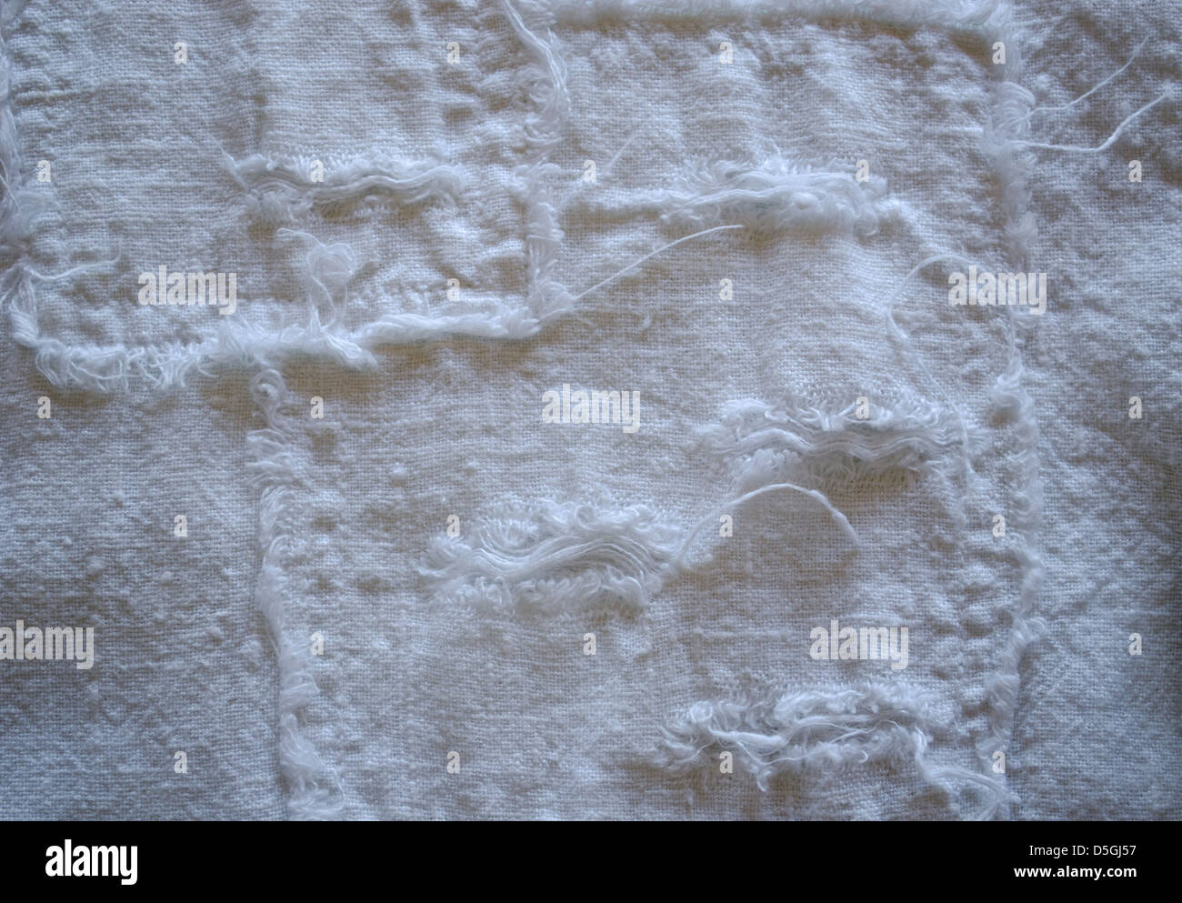 linen pant fabric closeup with long messy thread twist background Stock ...