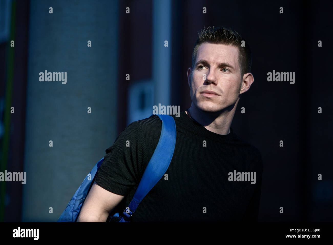 Man walking back alley hi-res stock photography and images - Alamy