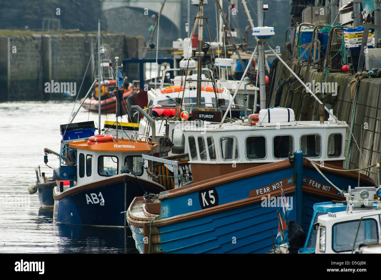 Small fishing boats moored in the harbour marina . Aberystwyth Wales UK ...