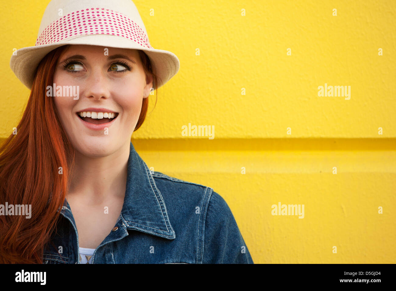 Red and yellow hat hi-res stock photography and images - Alamy