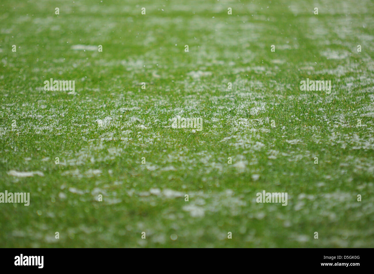 snow on football pitch Stock Photo - Alamy