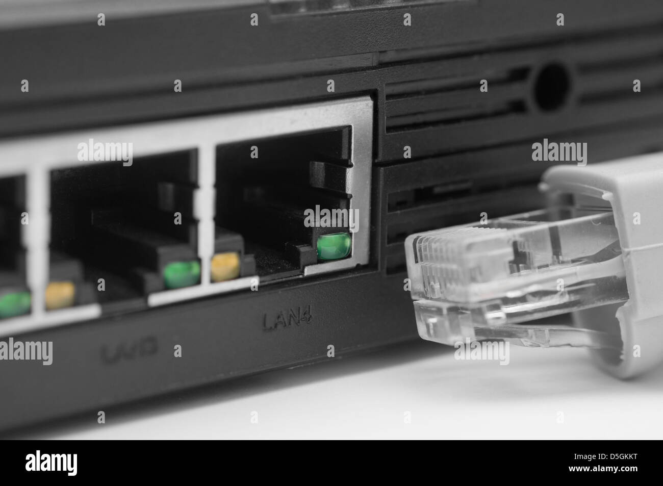 Router network hub with cable Stock Photo - Alamy