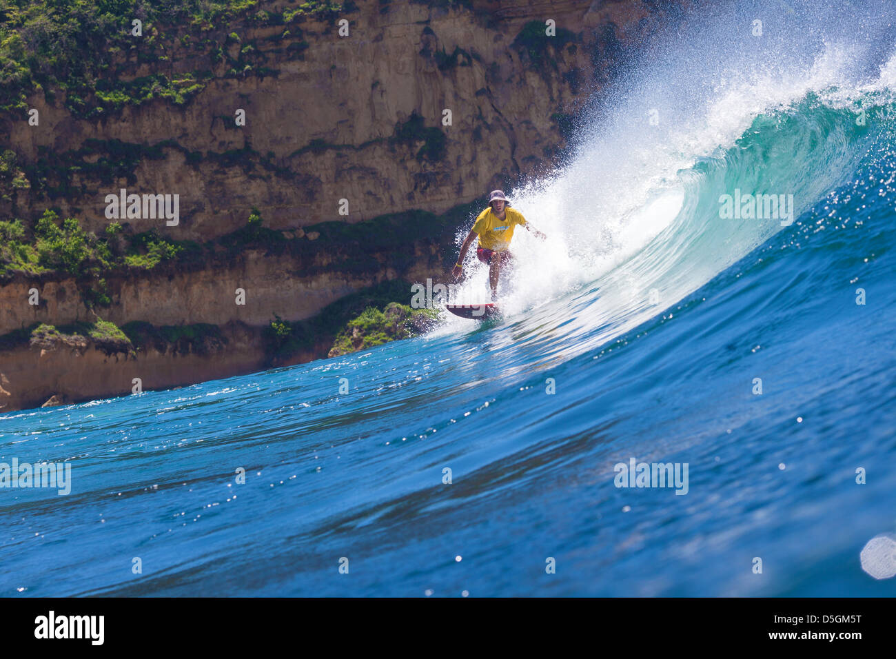Surfer riding wave reef hi-res stock photography and images - Alamy