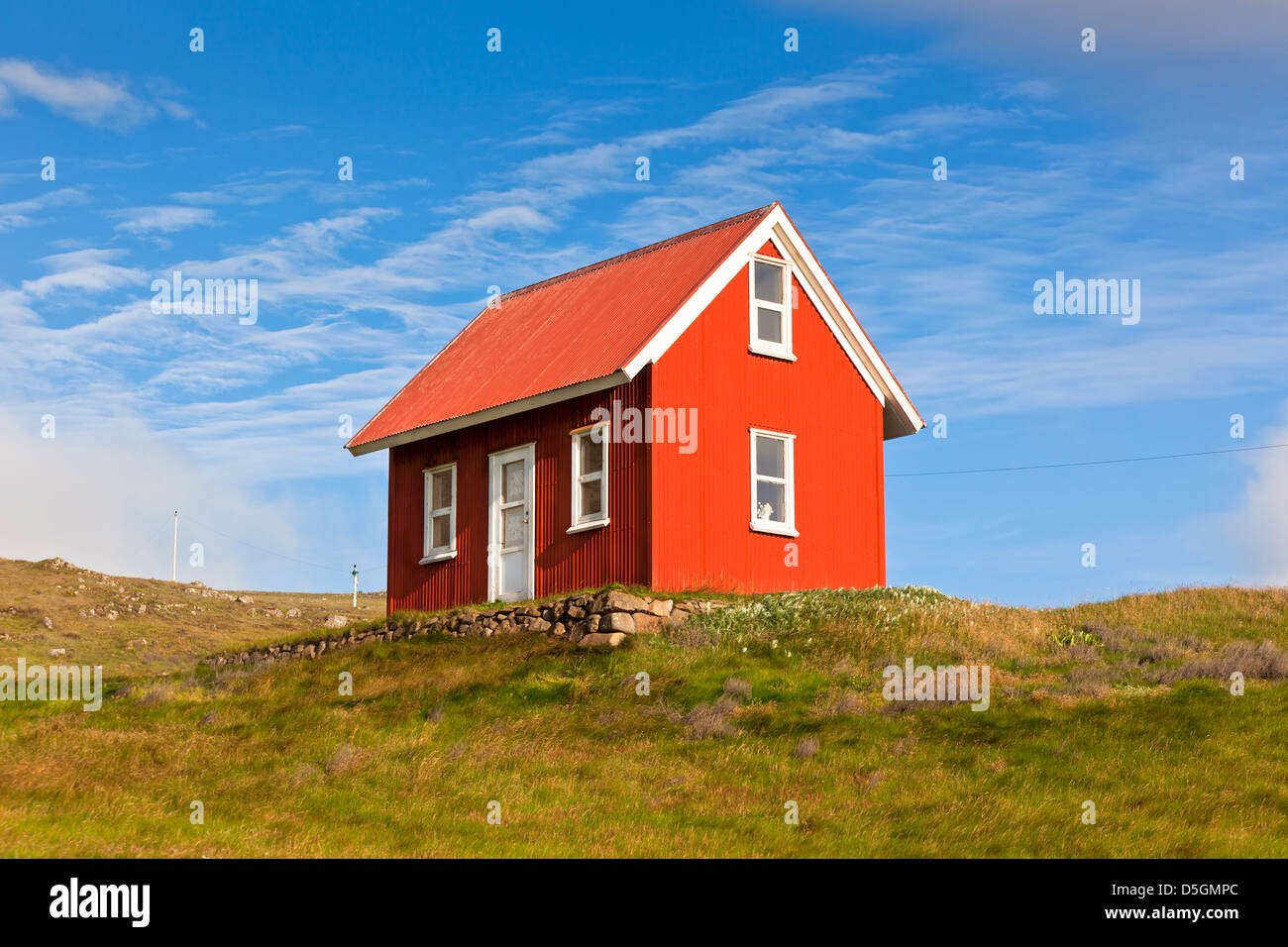 Bright Red Siding House in Iceland. Sunlight and Blue Sky Stock Photo ...