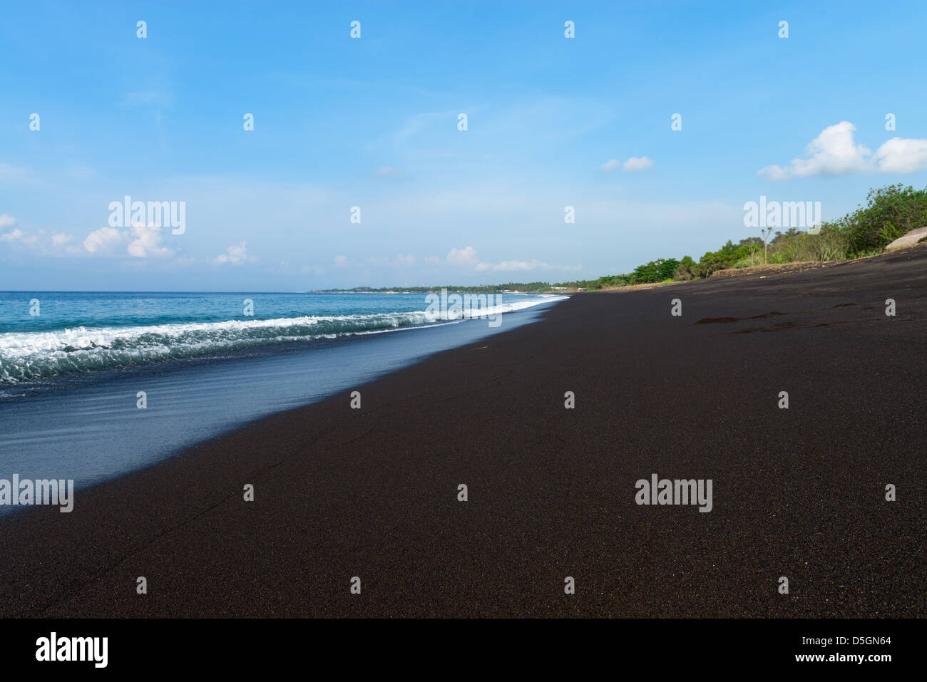 Black sand volcanic beach in Bali, Indonesia Stock Photo - Alamy