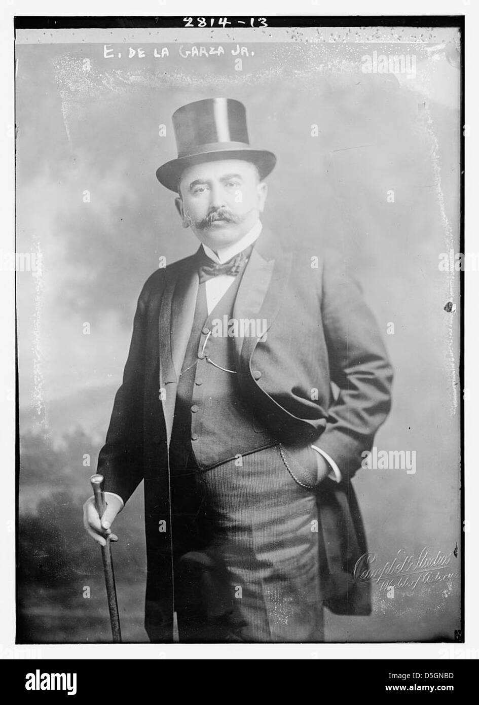 Portrait of E. De La Garza Jr., featuring his distinctive top hat and ...