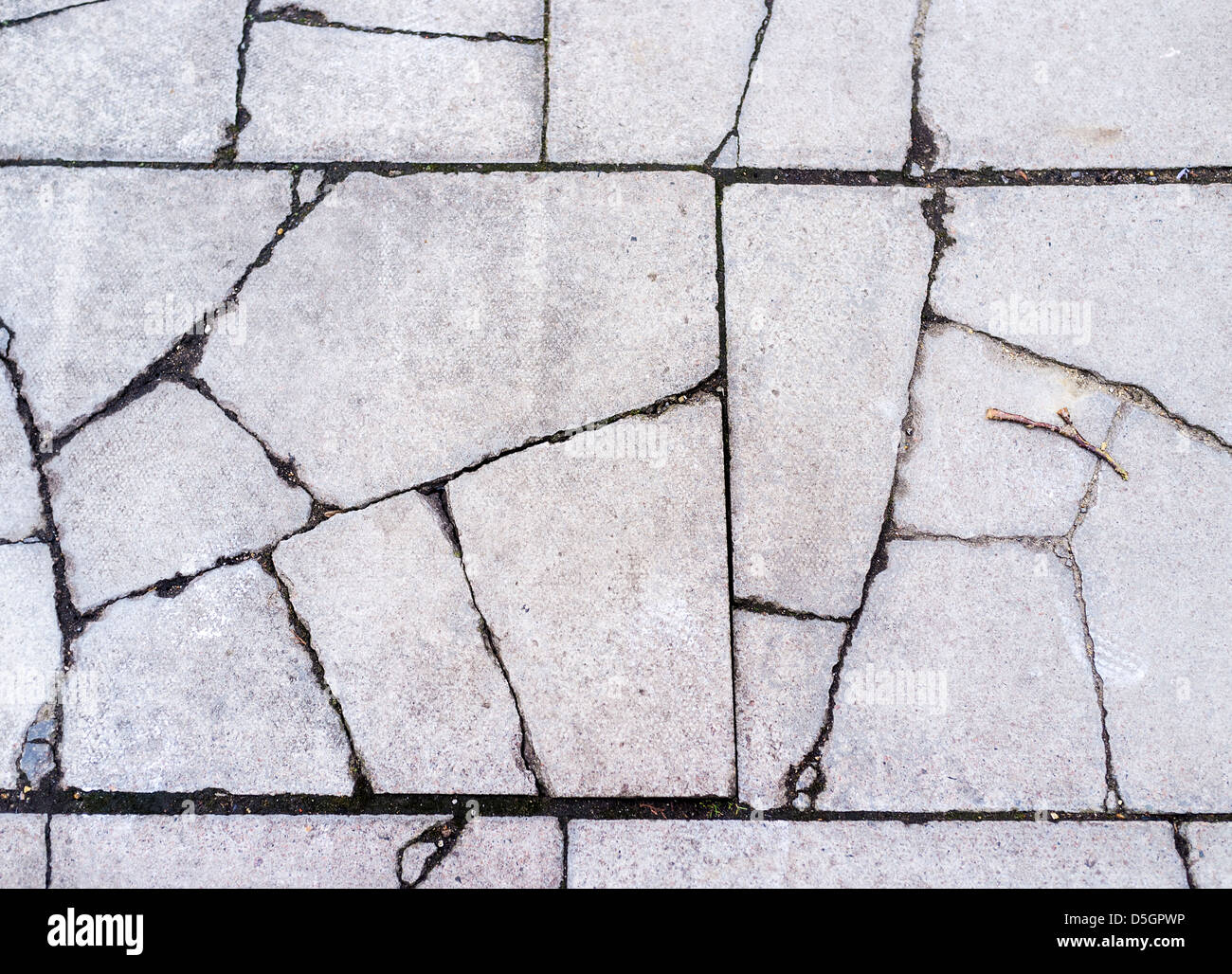Damaged pavement slabs Stock Photo - Alamy
