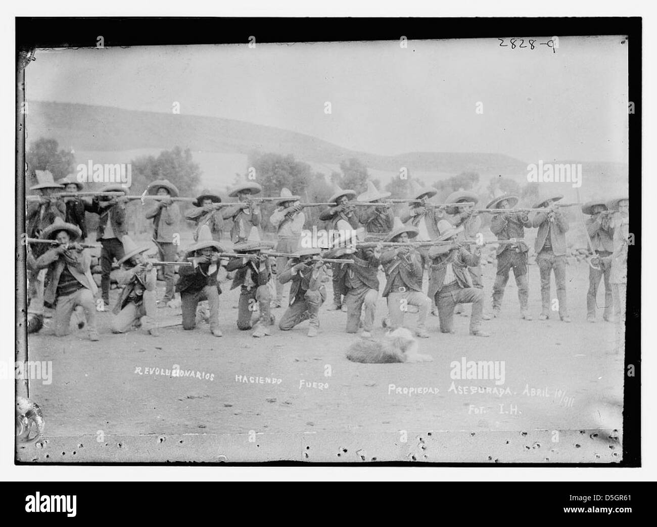 A photograph from 1910 showing Mexican Revolutionaries in combat, armed ...