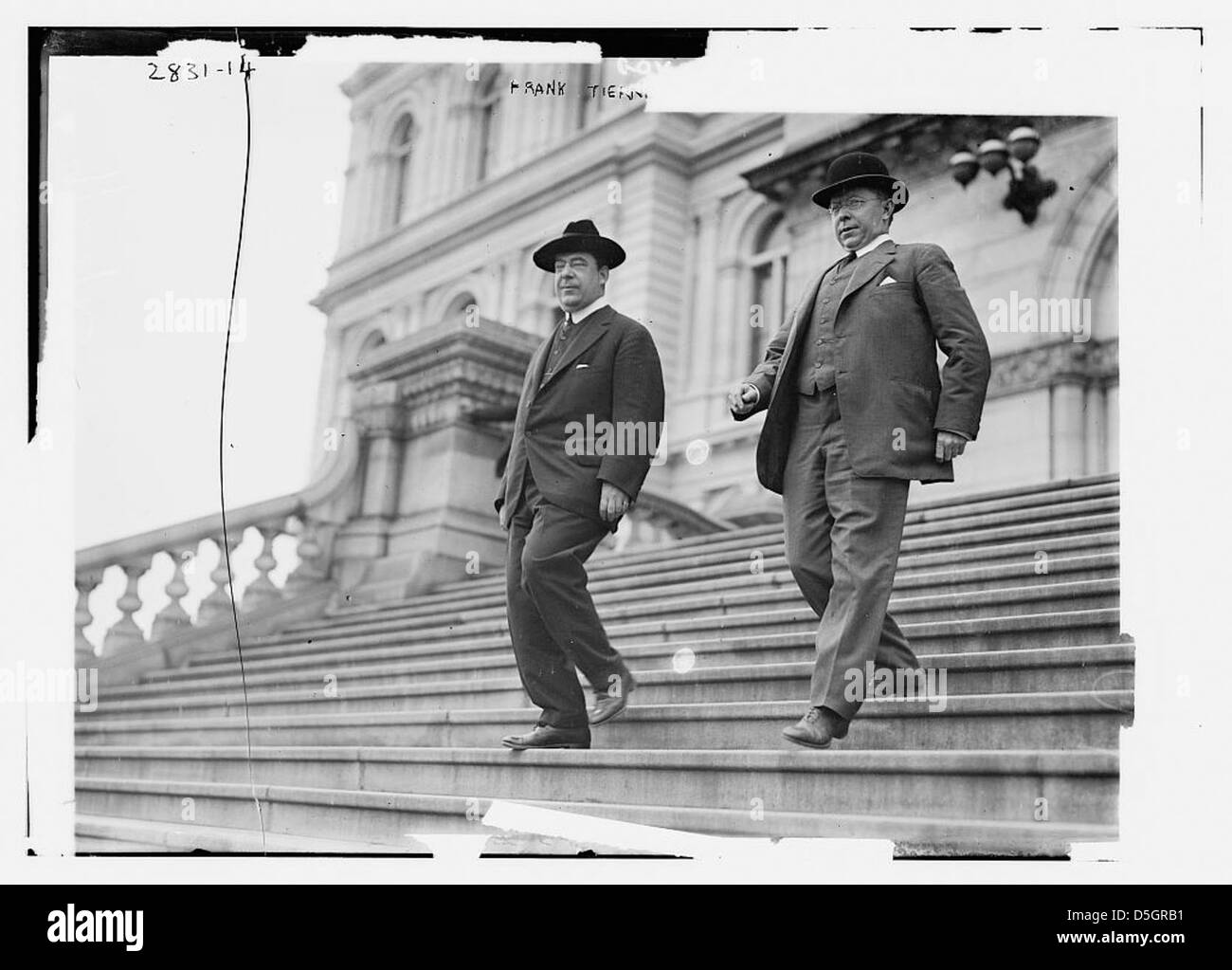 A historical portrait features Frank Tierney and Governor Martin Henry ...