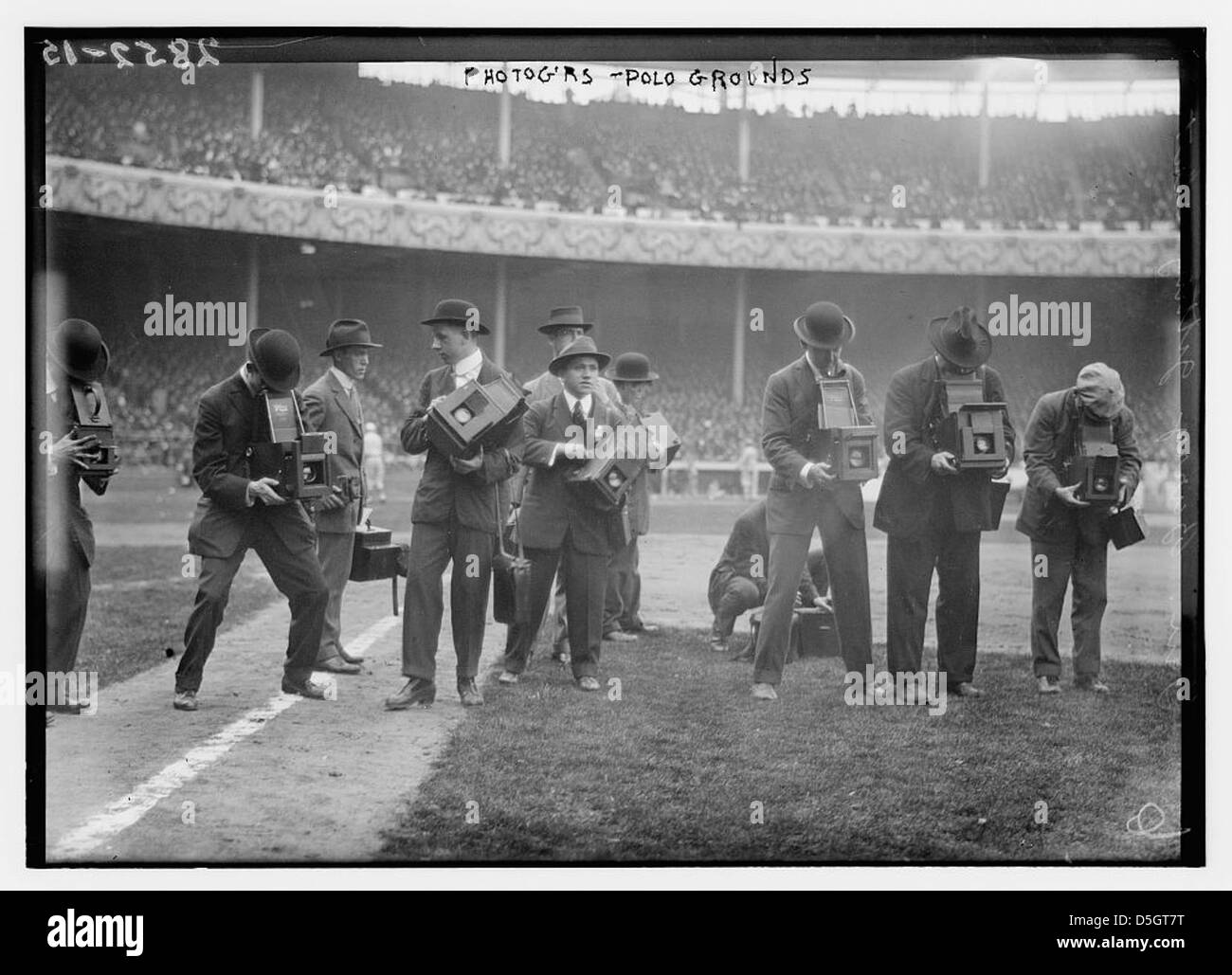 Photographer in action early Black and White Stock Photos & Images - Alamy