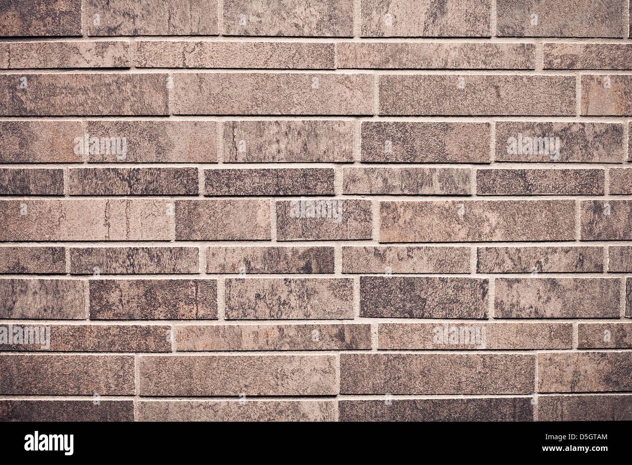 Neat modern brick wall as a detailed background Stock Photo - Alamy