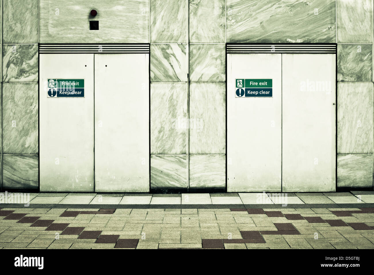 Two fire exit doors in a modern urban building Stock Photo - Alamy