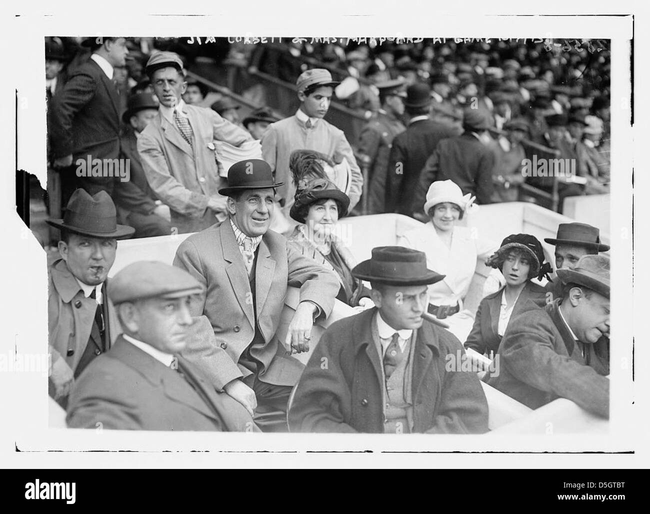 Jim Corbett and Mrs. Marquard are seen at a baseball game in 1913. This ...
