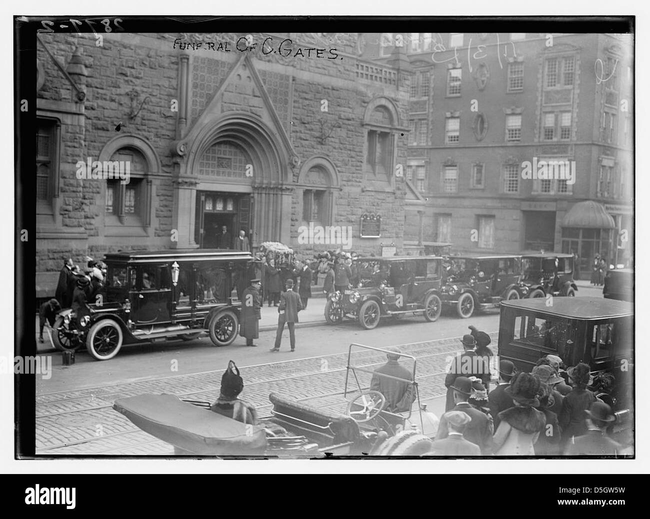 This photograph depicts the funeral of Charles Gilbert Gates, held at ...