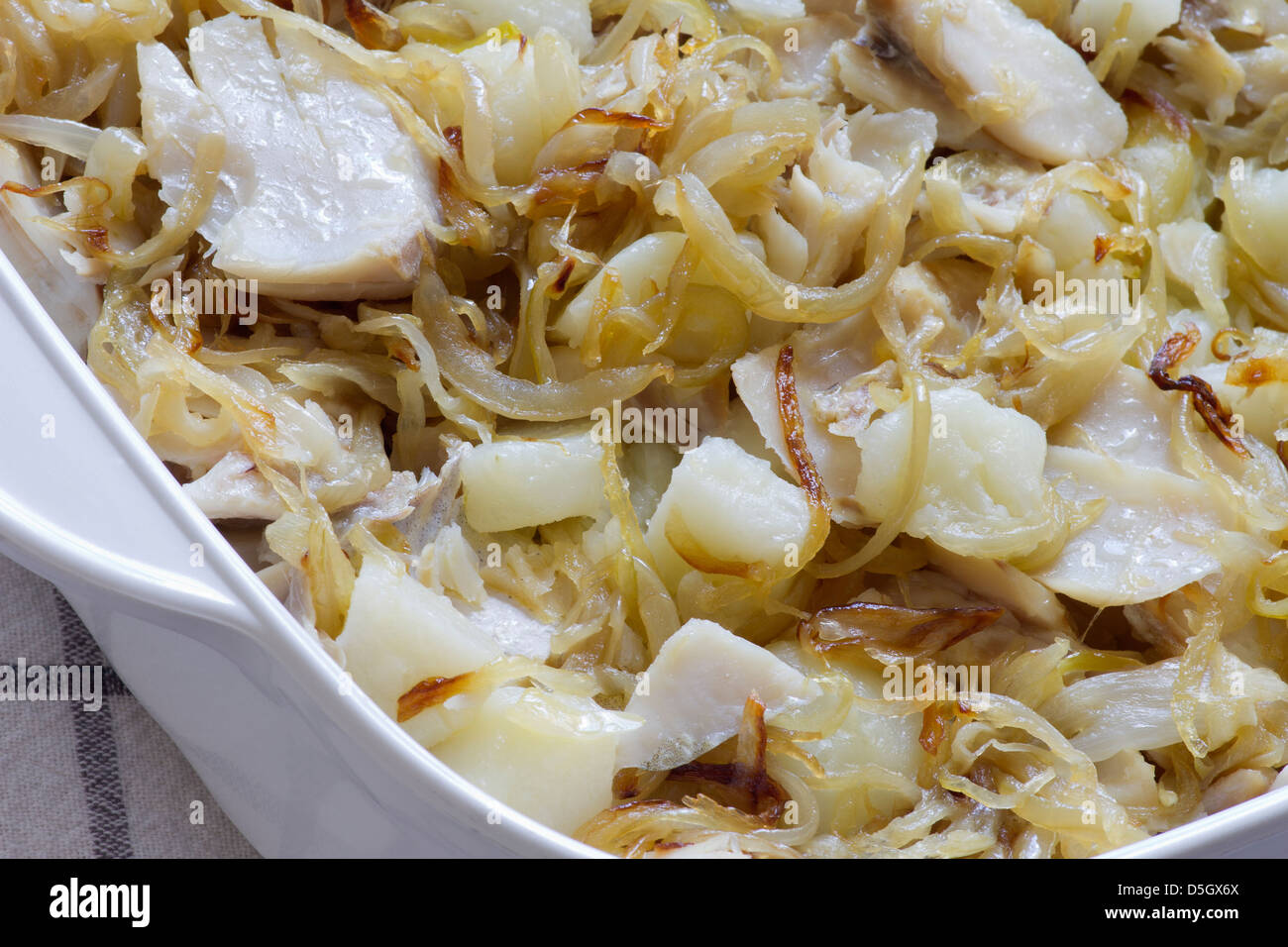 Baked cod potatoes onions hi-res stock photography and images - Alamy