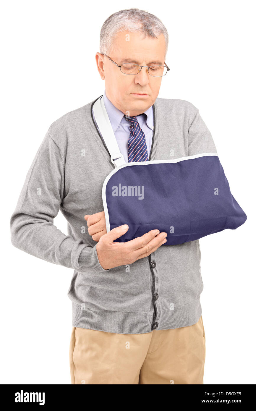 A senior man with a broken arm posing isolated against white background ...