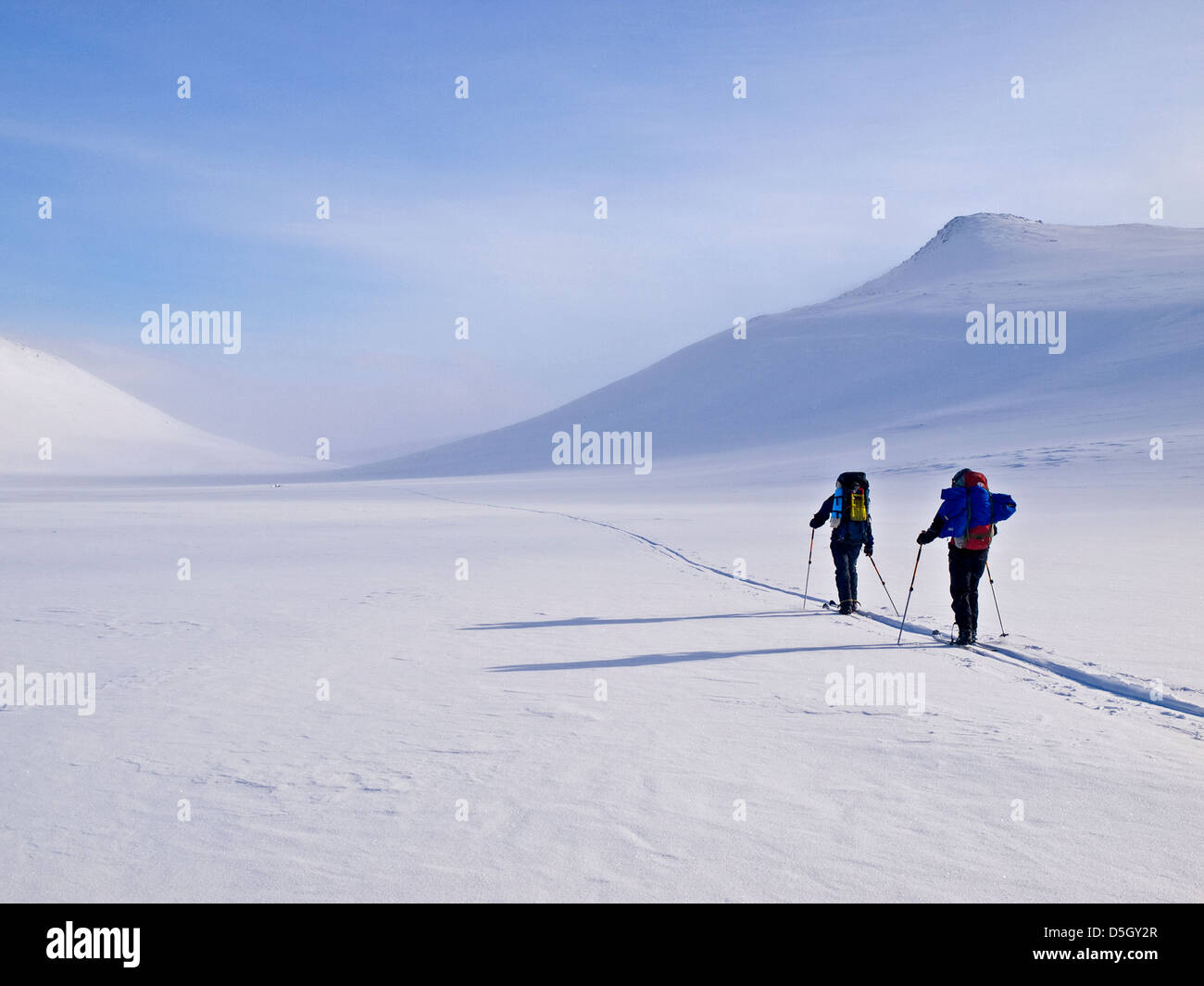 Two people ski touring in Northern Finland Stock Photo - Alamy