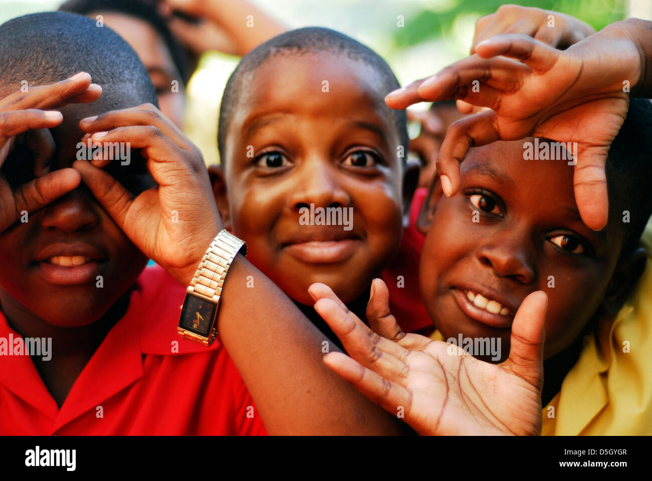 Grenada, St George, schoolchildren making gestures of photographer. (MR ...