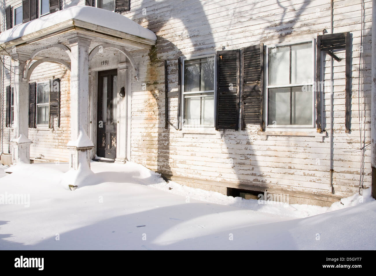 Rundown haunted home with snow and ice cycles, Ma., New England, USA ...