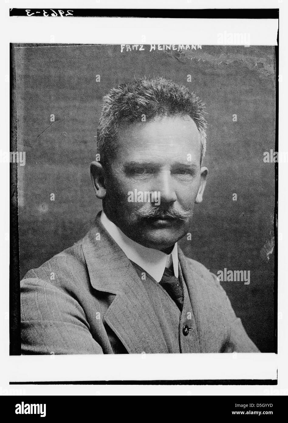 Fritz Heinmann is featured in a photograph, possibly a historical ...