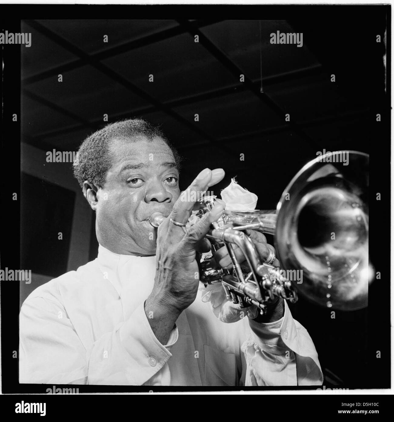 A portrait of the legendary jazz musician Louis Armstrong, taken at ...