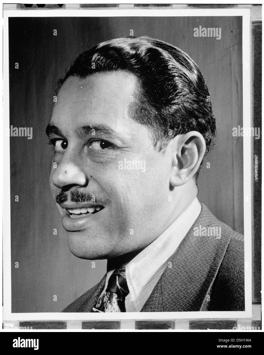 Cab Calloway, the renowned jazz singer and bandleader, is shown in this ...