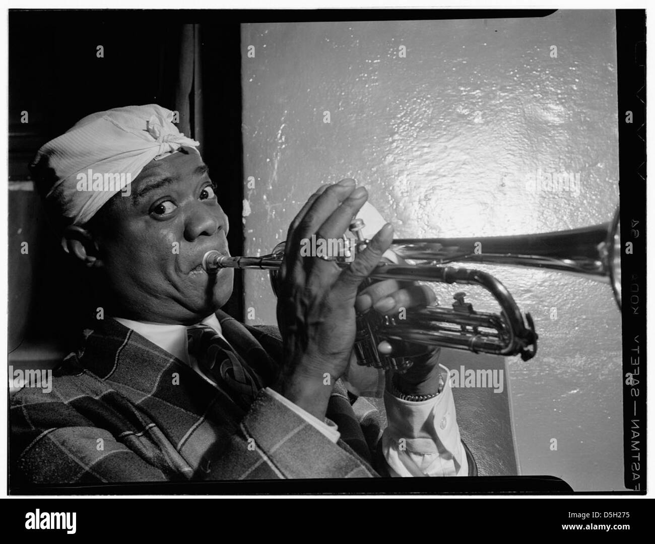 A portrait of jazz musician Louis Armstrong, also known as 'Satchmo ...
