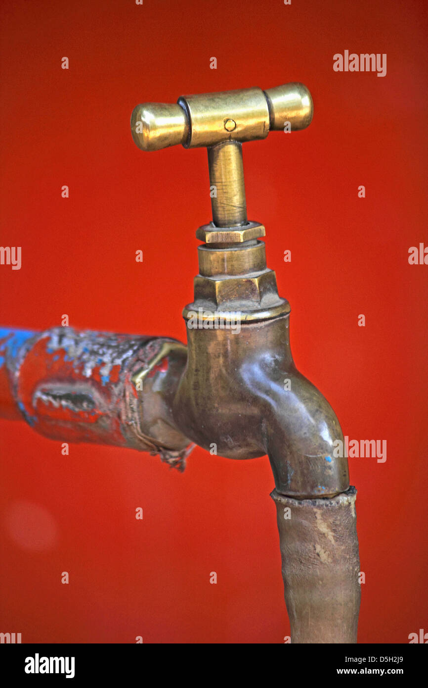 Community Water Tap Stock Photo - Alamy