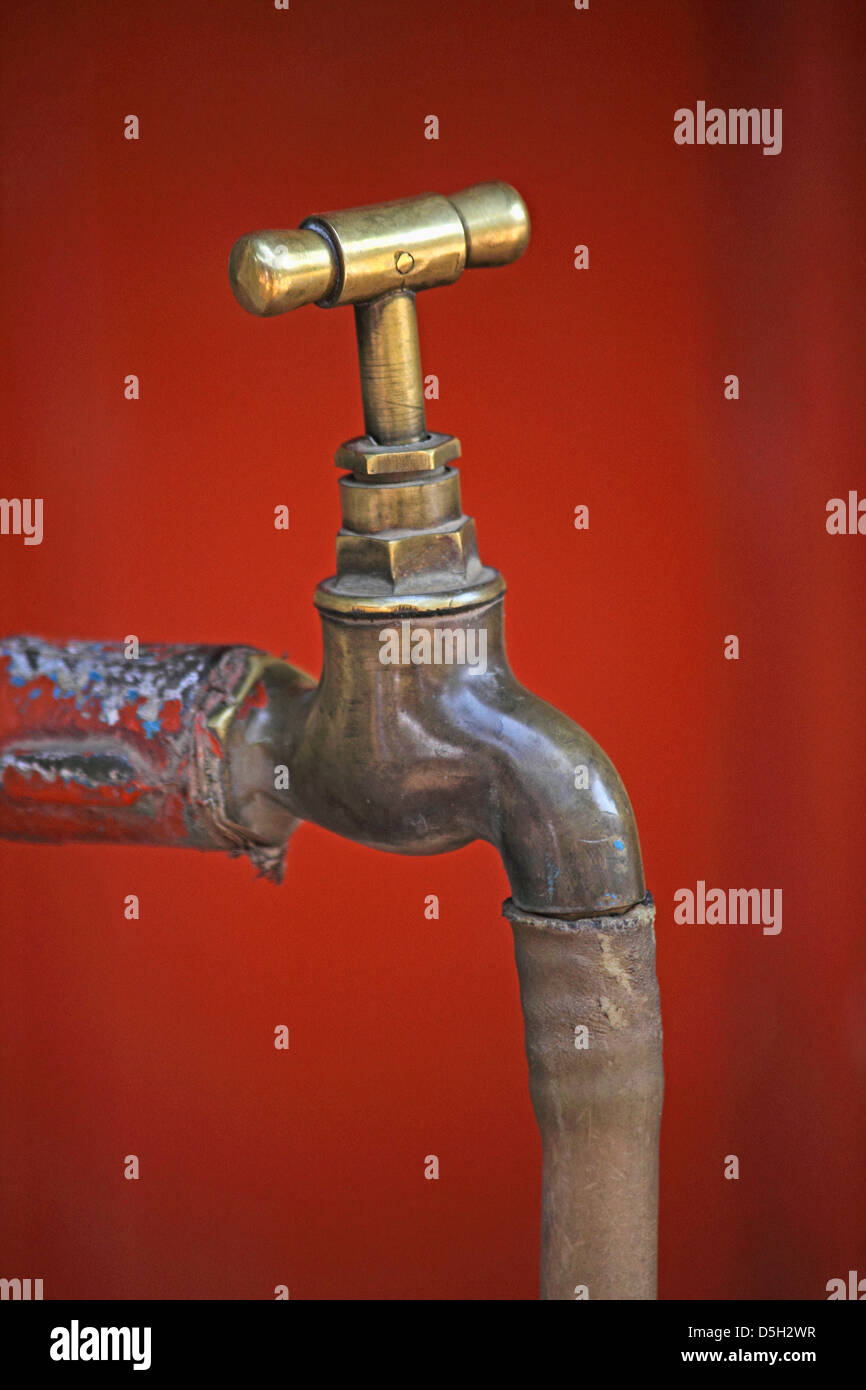 Community Water Tap Stock Photo - Alamy