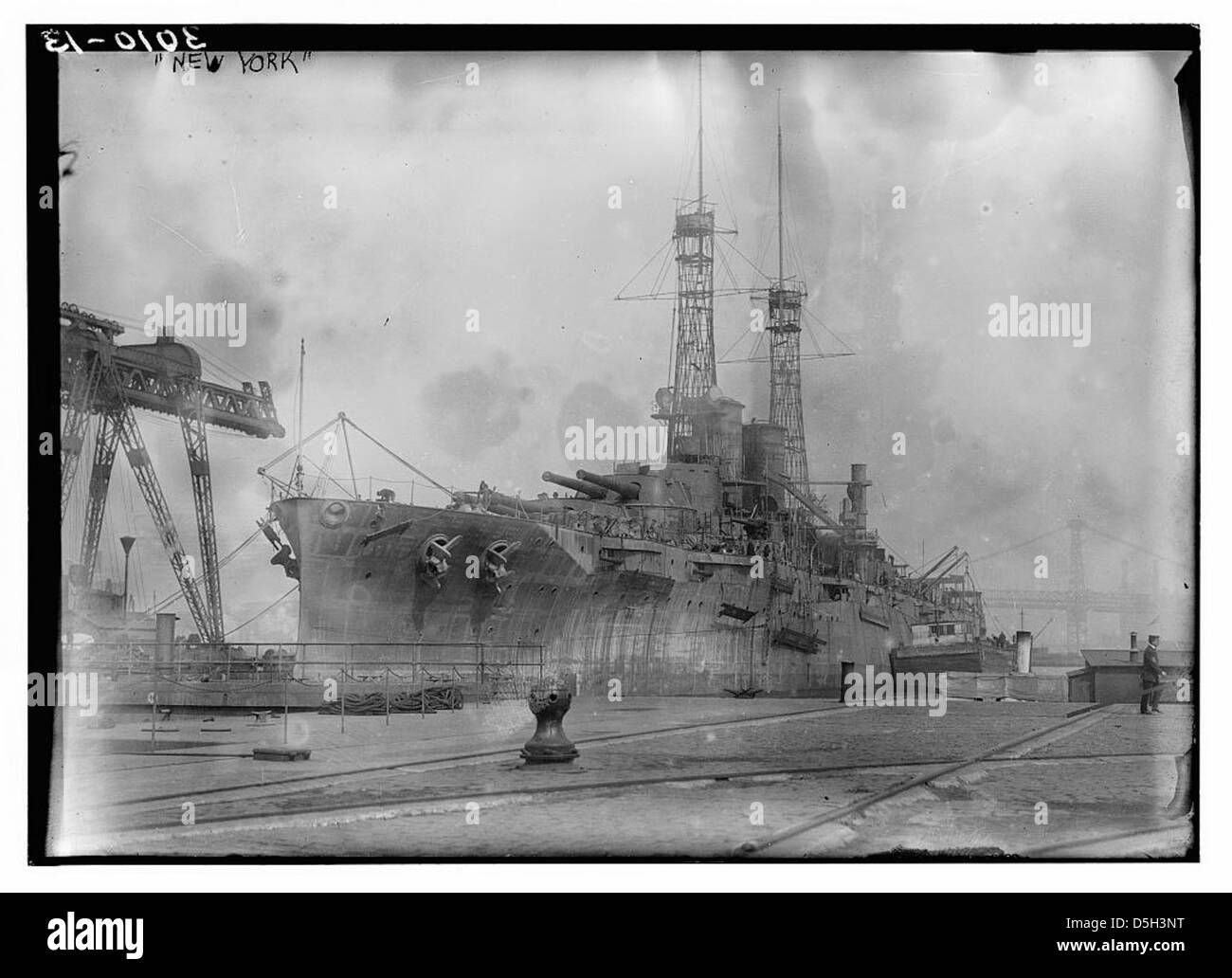 This historical photograph features the USS New York (BB-34), a New ...