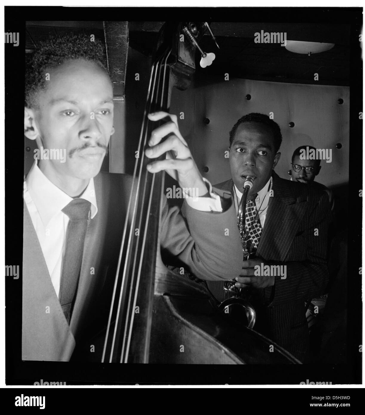 Jazz musicians Charlie Parker, Tommy Potter, and Max Roach are captured ...