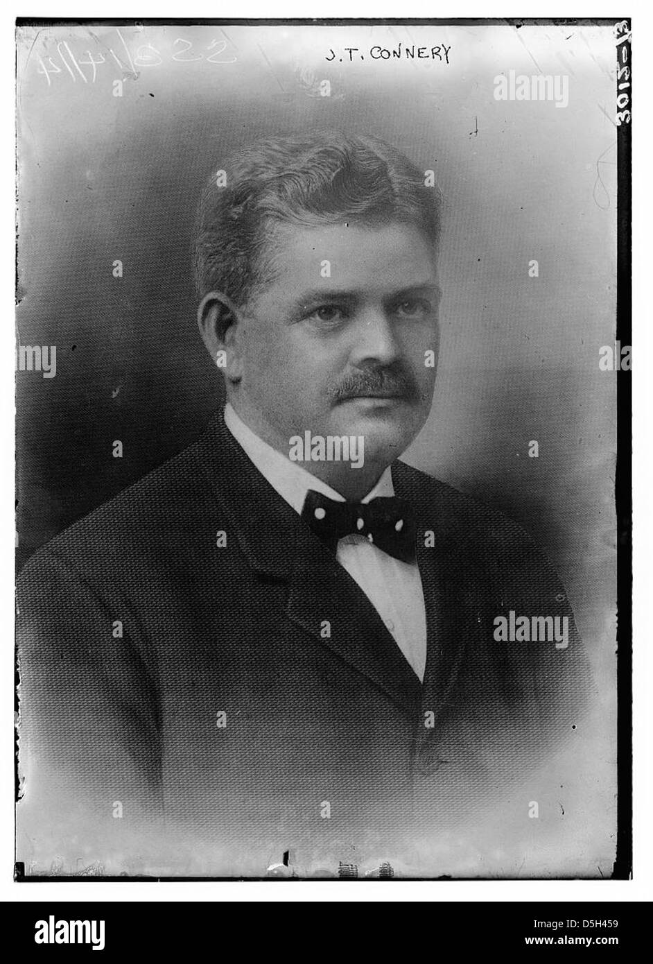 J.T. Connery is captured in this portrait, featuring his bowtie and ...