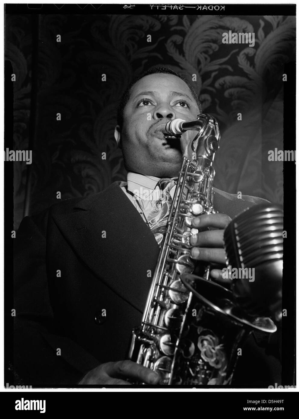 Tab Smith, a notable jazz musician, is featured in a portrait taken in ...