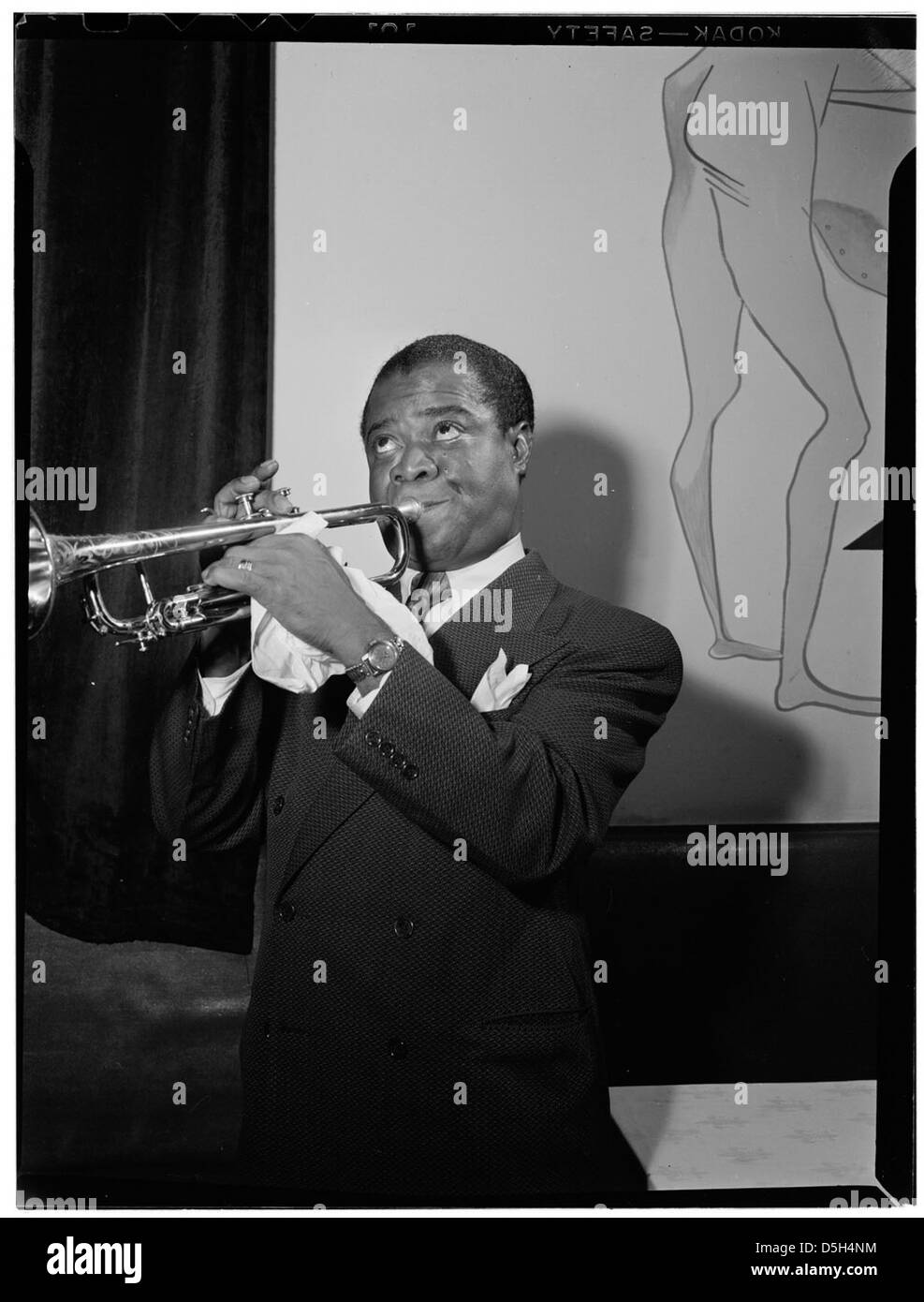 A portrait of jazz legend Louis Armstrong, captured between 1938 and ...