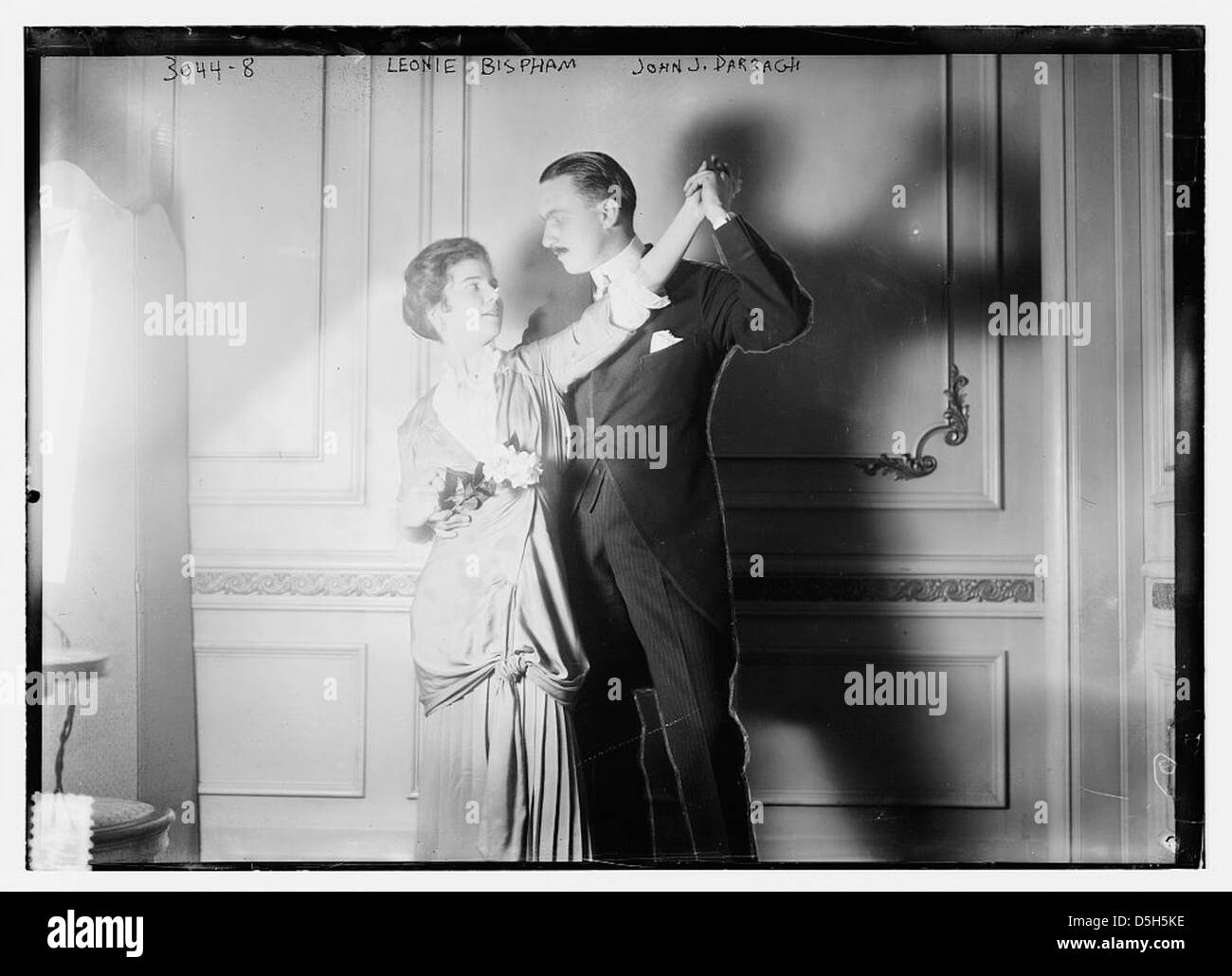 Leonie Bispham and John J. Darragh are shown dancing in a historical ...