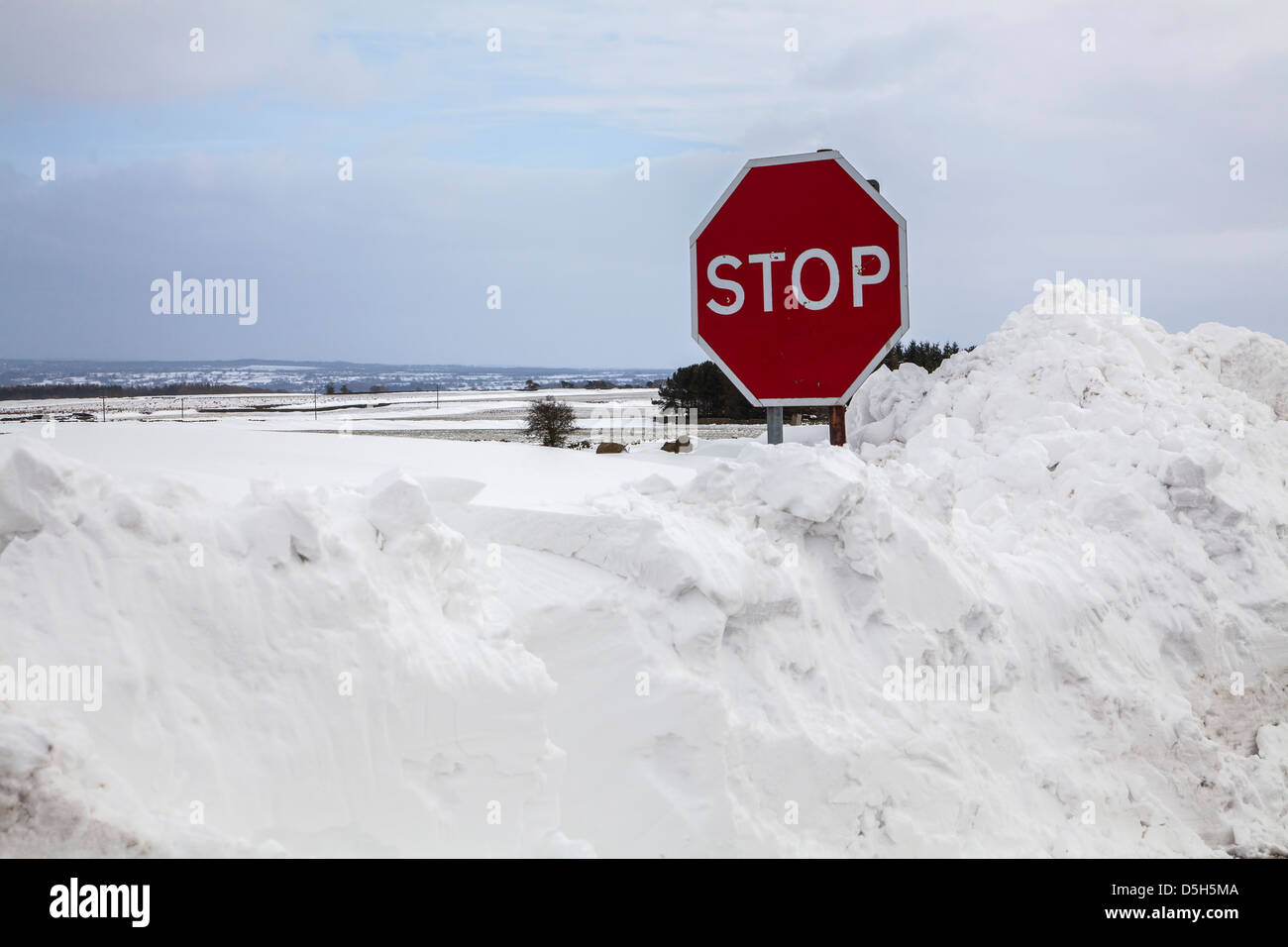 Road sign surrounded by Snow near Pateley Bridge, North Yorkshire Stock ...