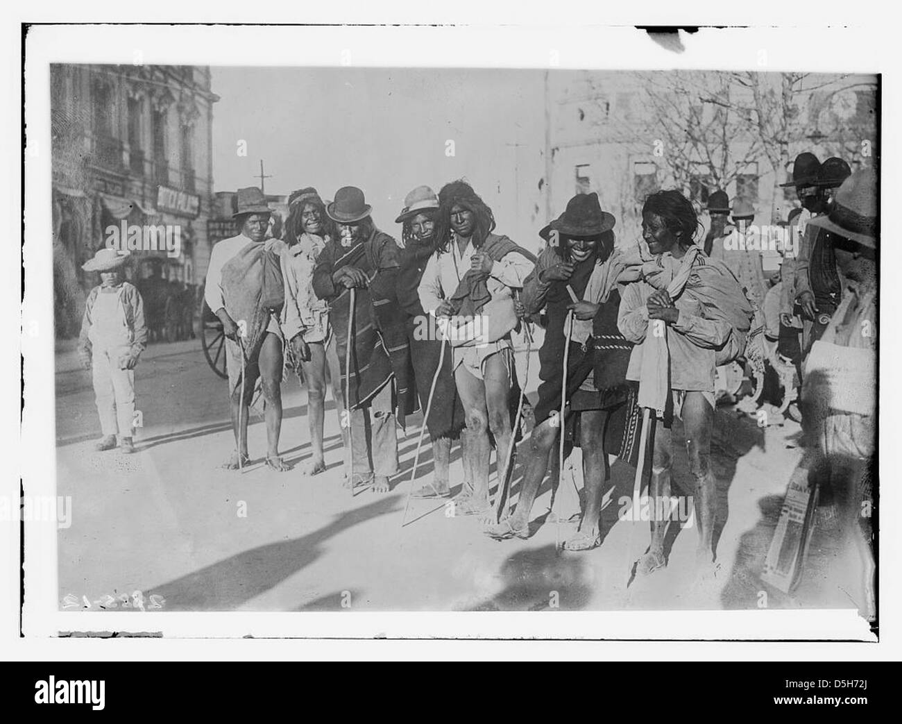 Individuals in traditional attire walking hi-res stock photography and ...