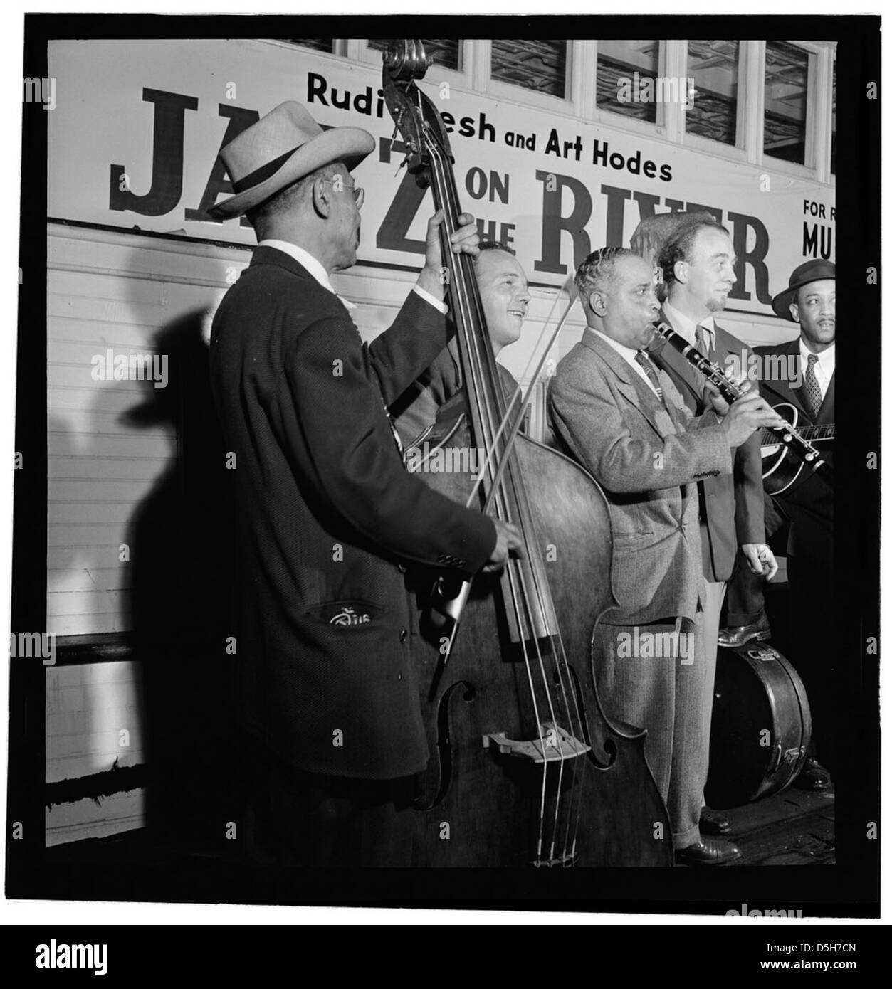 A photograph of jazz musicians Albert Nicholas and Rudi Blesh aboard a ...
